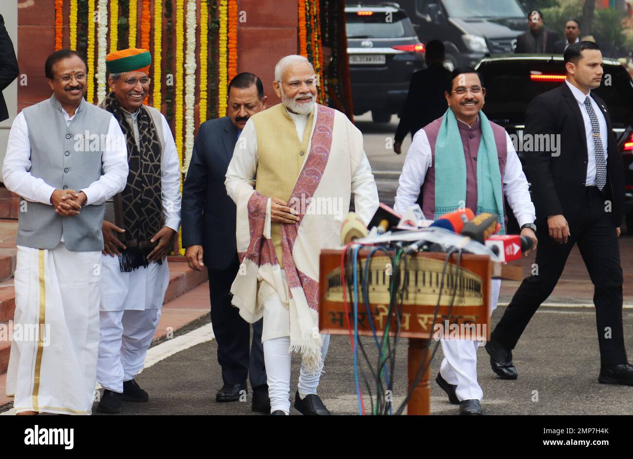 Indian Prime Minister Narendra Modi (C) being received by his cabinet ...