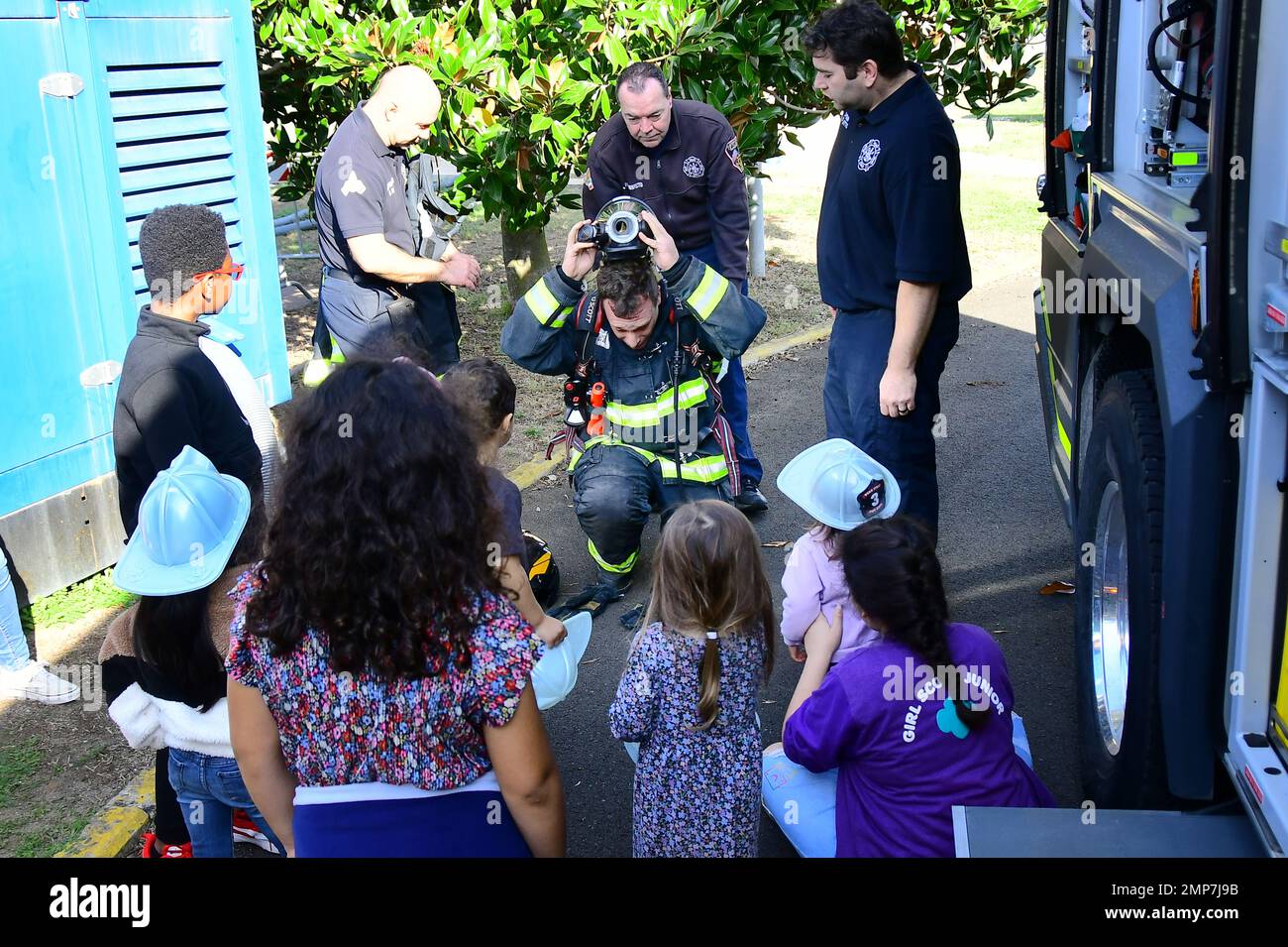 Center, Emanuele Zumbo firefighter wears special clothing, called ...