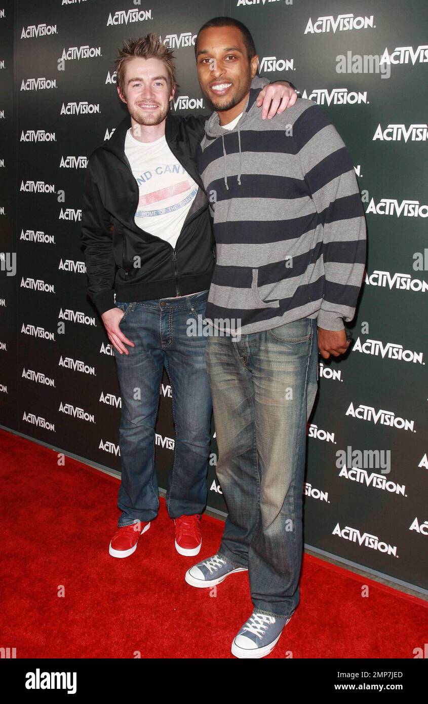 Actors Robert Buckley and Charles Porter arrive at Activision E3 2010 ...