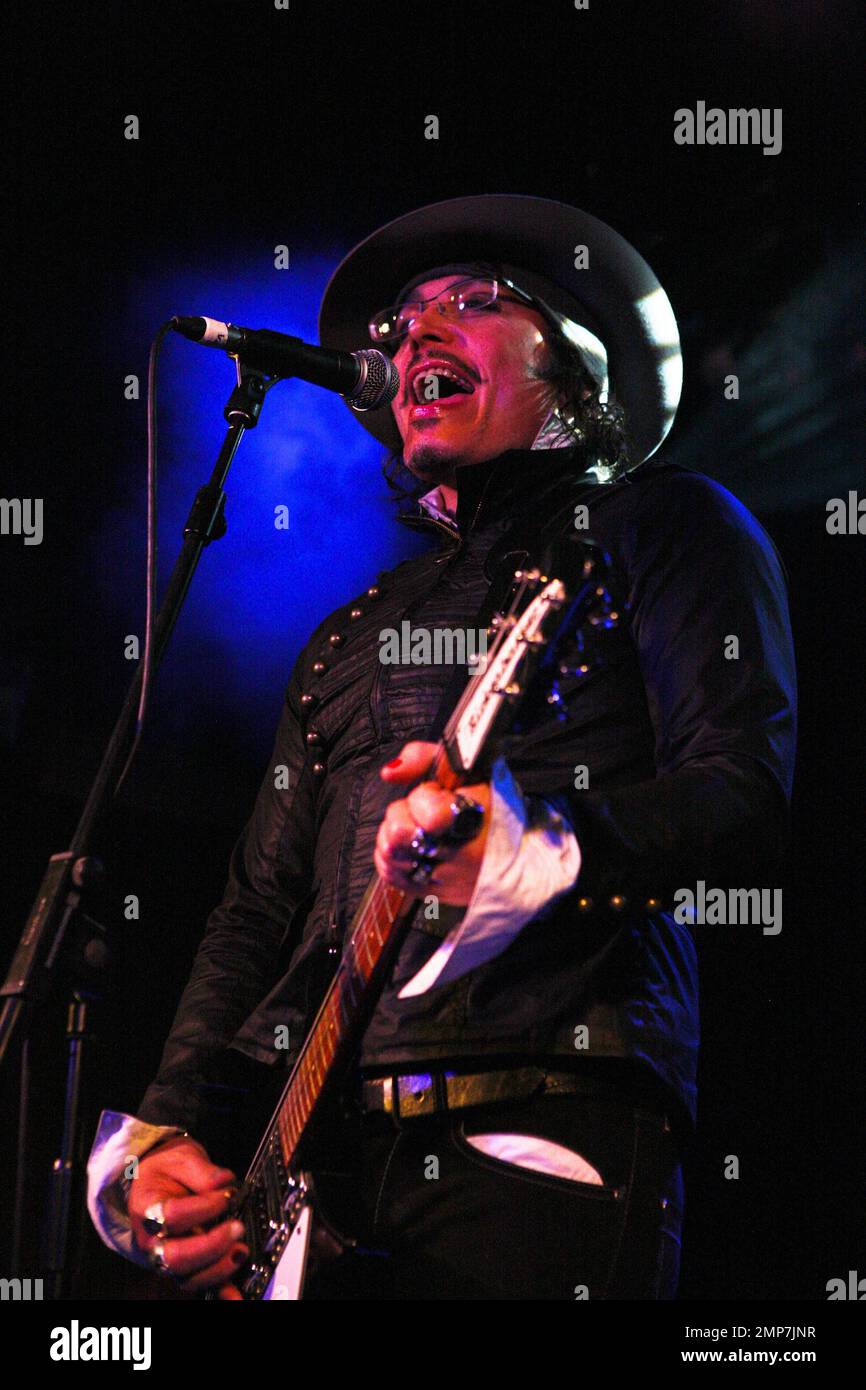 With his nails painted red and with a 'X' drawn on his cheek UK singer ...