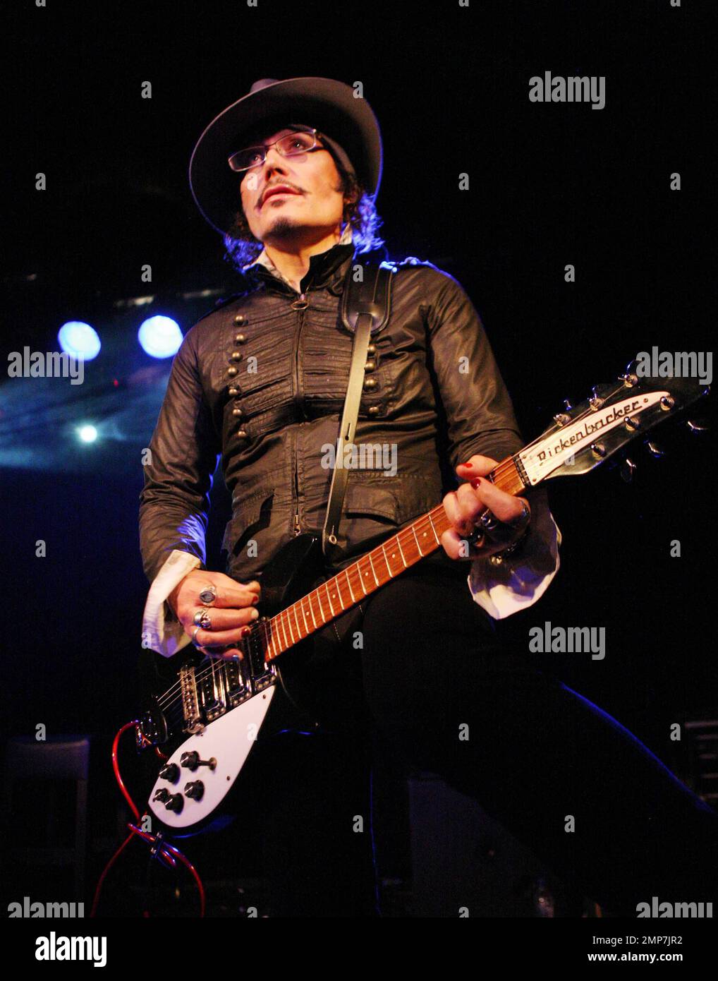 With his nails painted red and with a 'X' drawn on his cheek UK singer ...