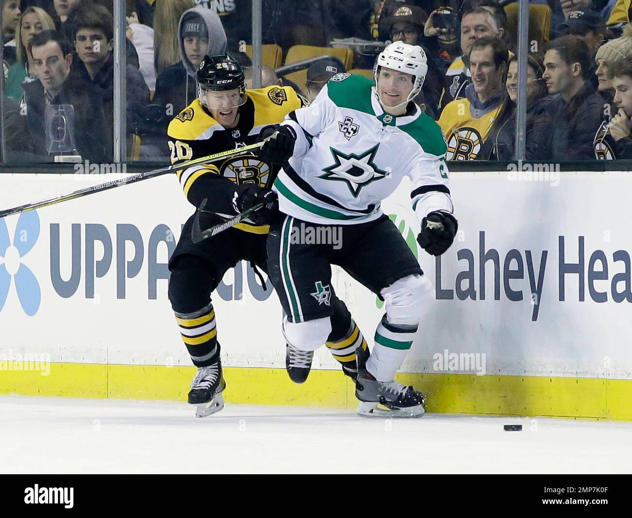 Boston Bruins center Riley Nash, left, vies with Dallas Stars left wing ...