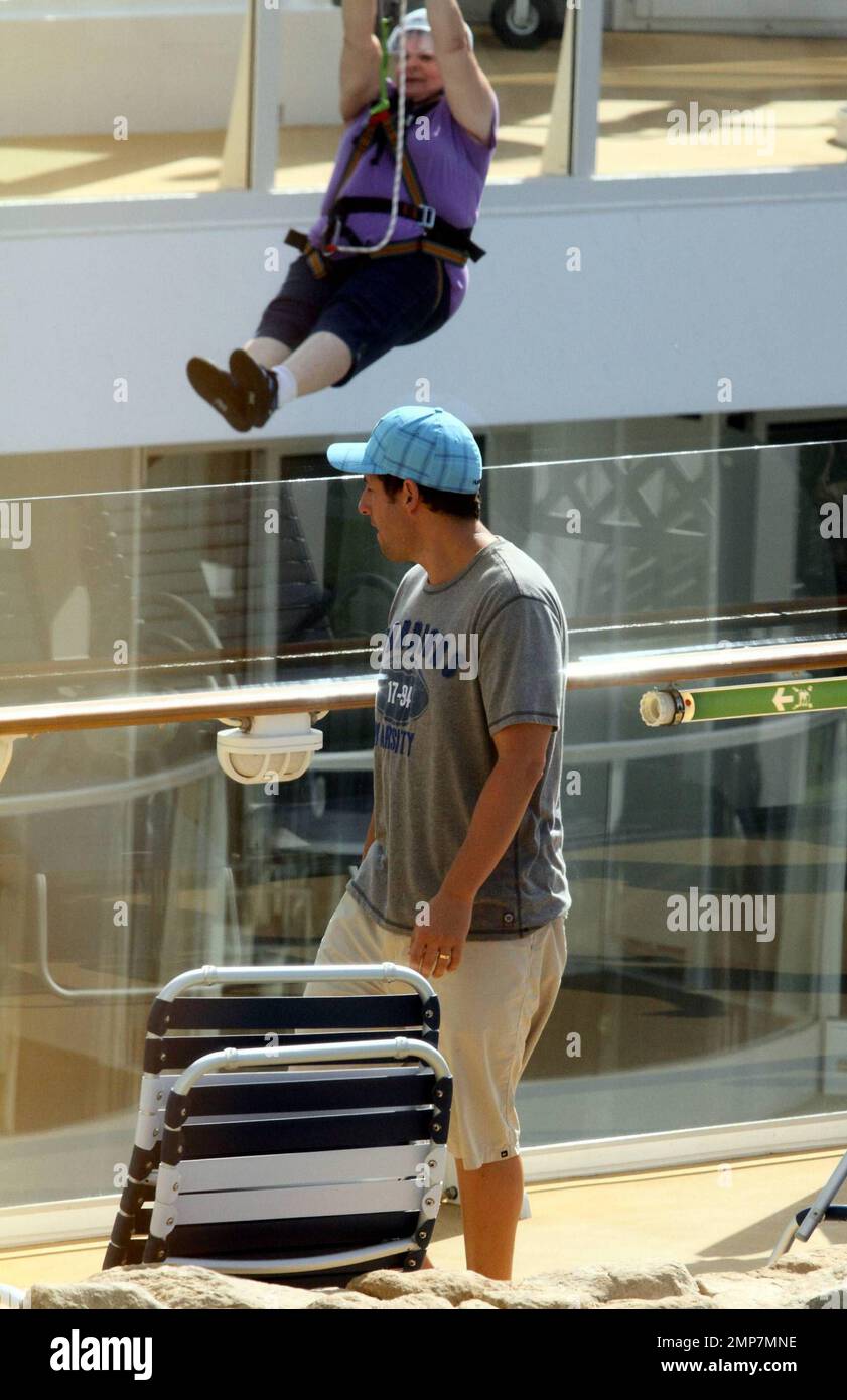 Actor Adam Sandler strolls during some downtime from filming on Royal ...