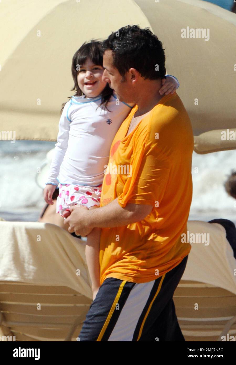 "Jack and Jill" star Adam Sandler spends a day at the beach with ...