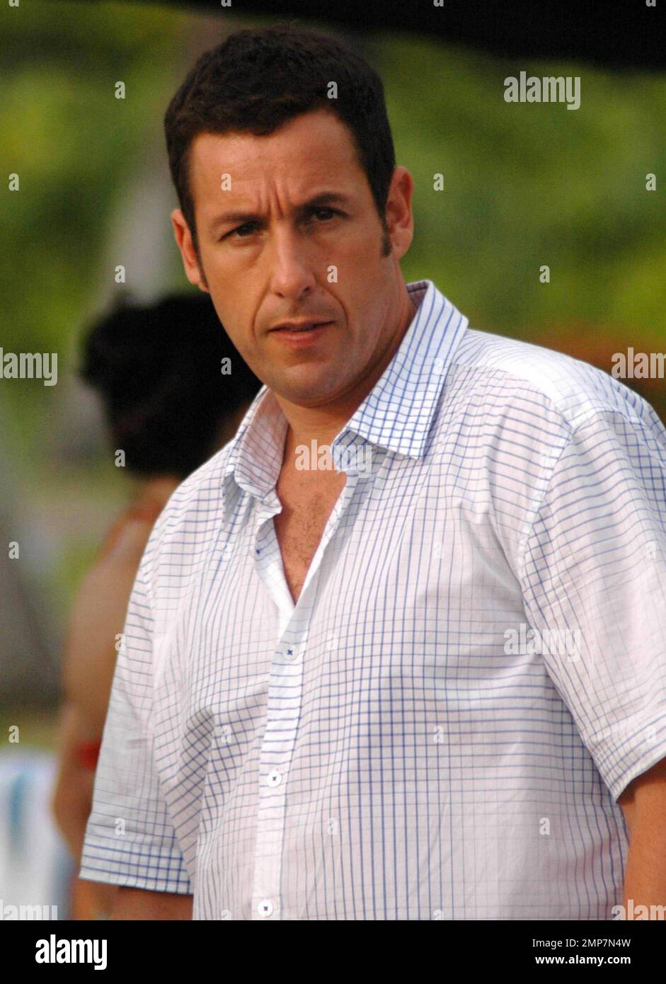 Actor Adam Sandler makes his way around the Maui set of "Just Go With ...