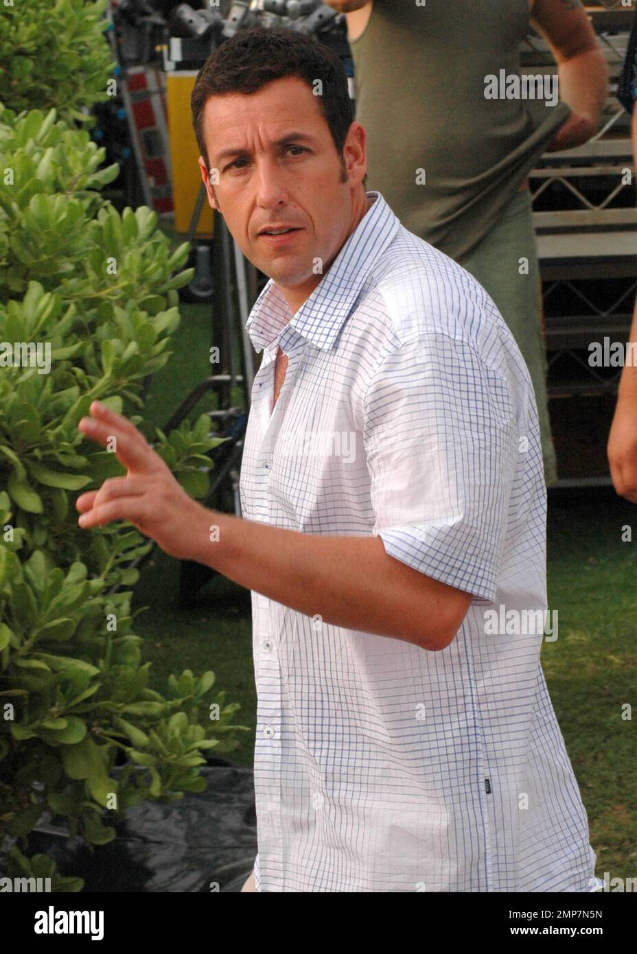 Actor Adam Sandler makes his way around the Maui set of "Just Go With ...