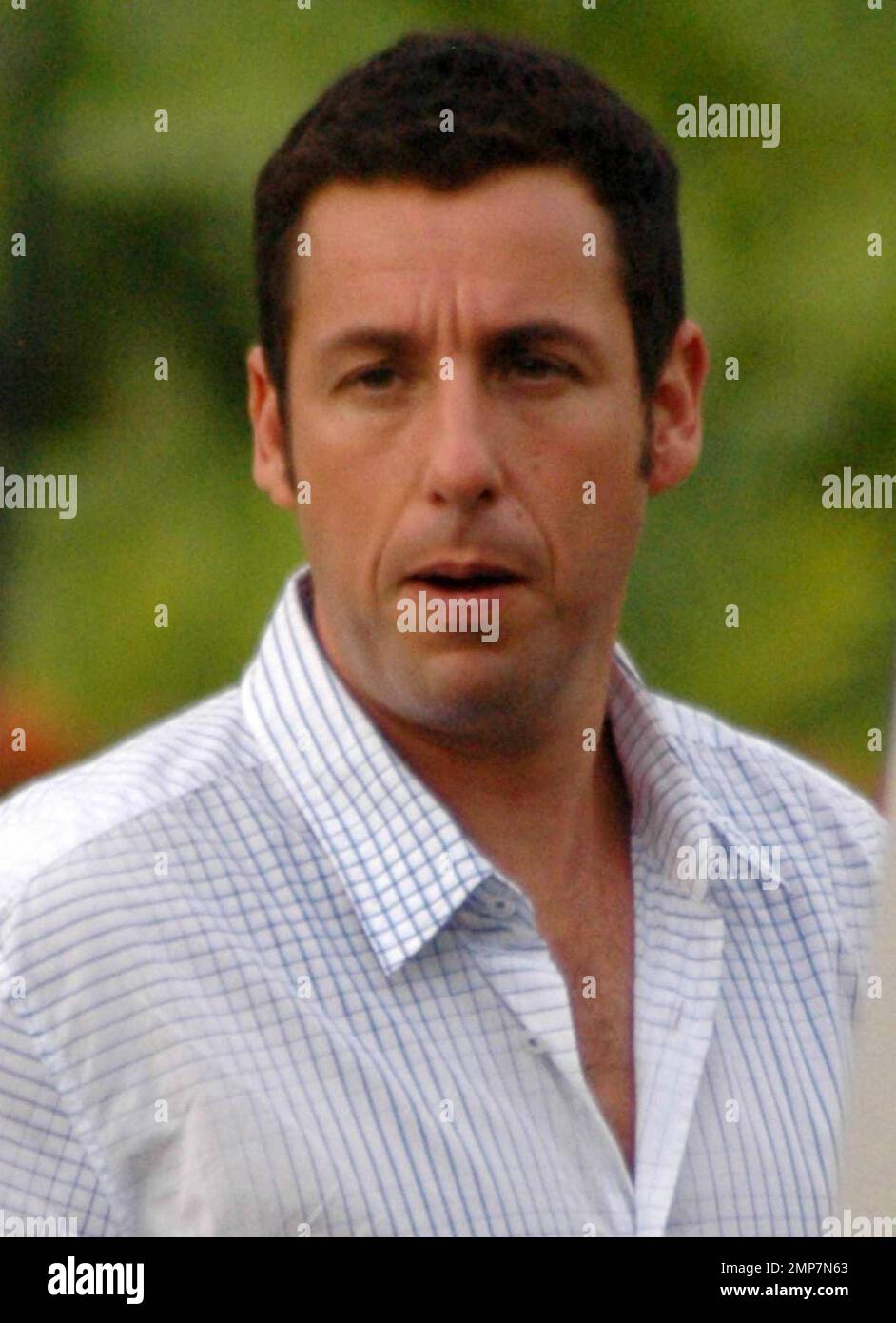 Actor Adam Sandler makes his way around the Maui set of "Just Go With ...