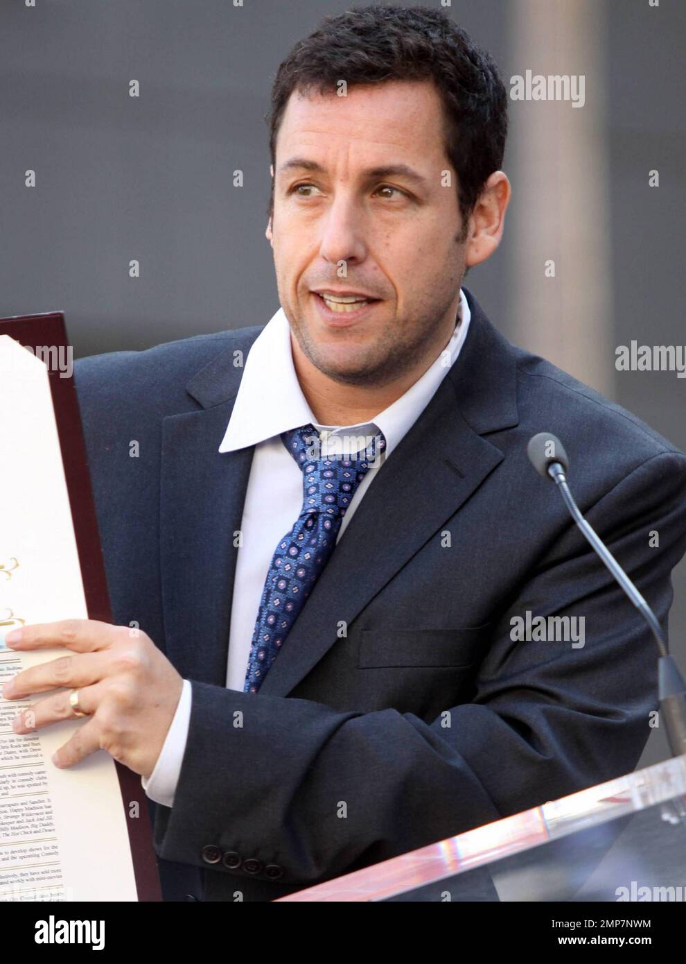 Joined by his wife Jackie, daughters Sadie and Sunny and his mother ...