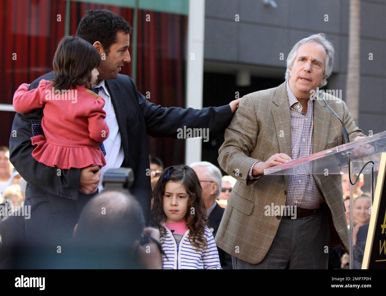 Joined by his wife Jackie, daughters Sadie and Sunny and his mother ...