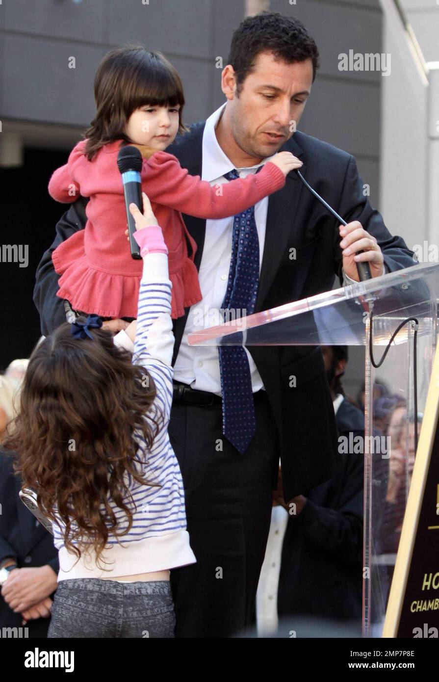 Joined by his wife Jackie, daughters Sadie and Sunny and his mother ...