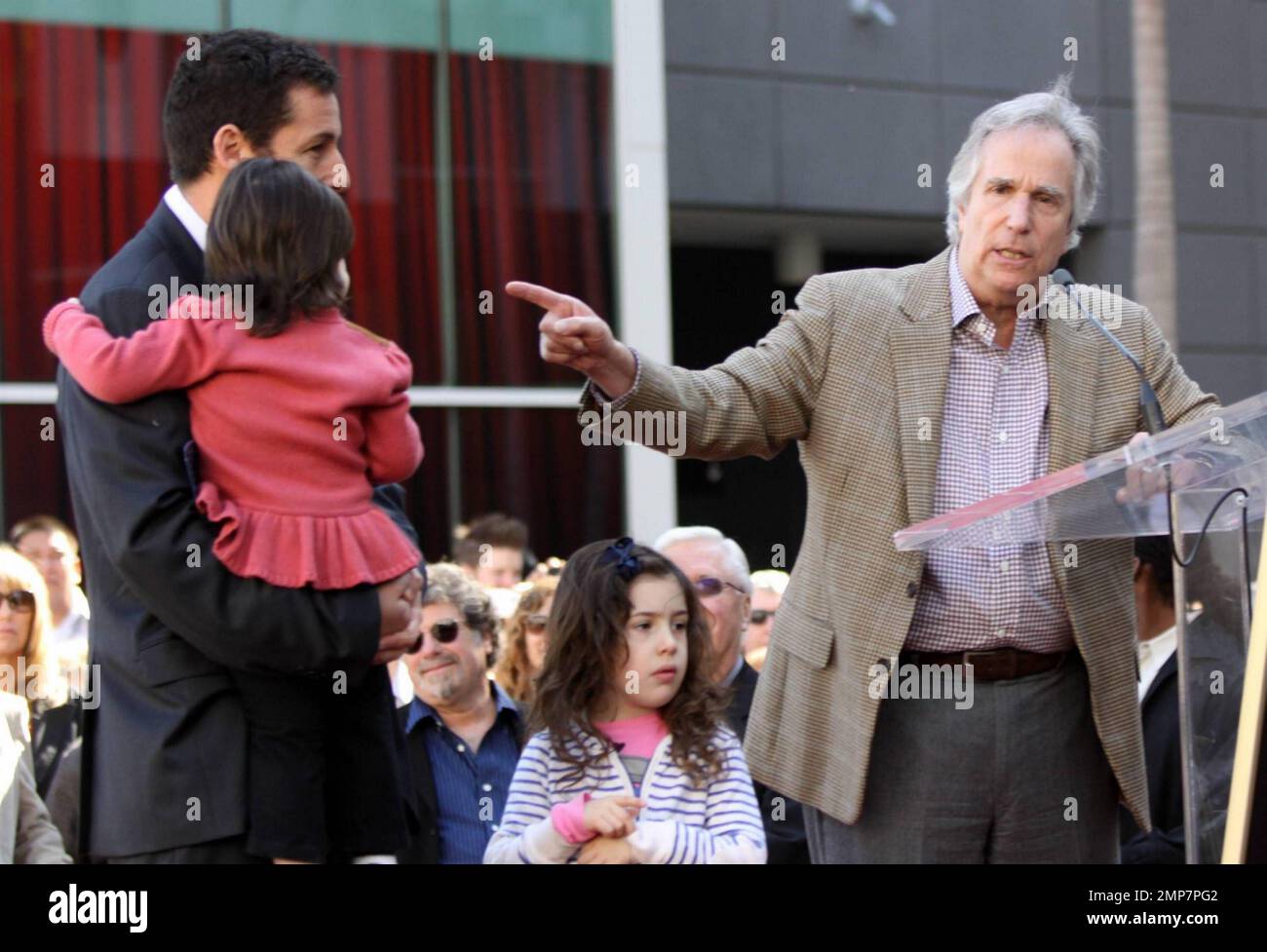 Joined by his wife Jackie, daughters Sadie and Sunny and his mother ...