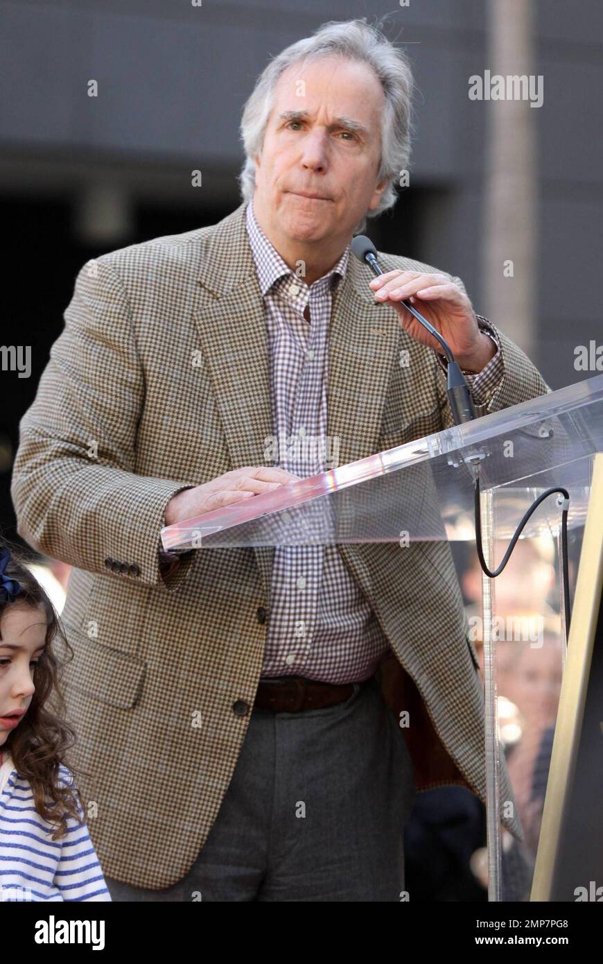 Joined by his wife Jackie, daughters Sadie and Sunny and his mother ...