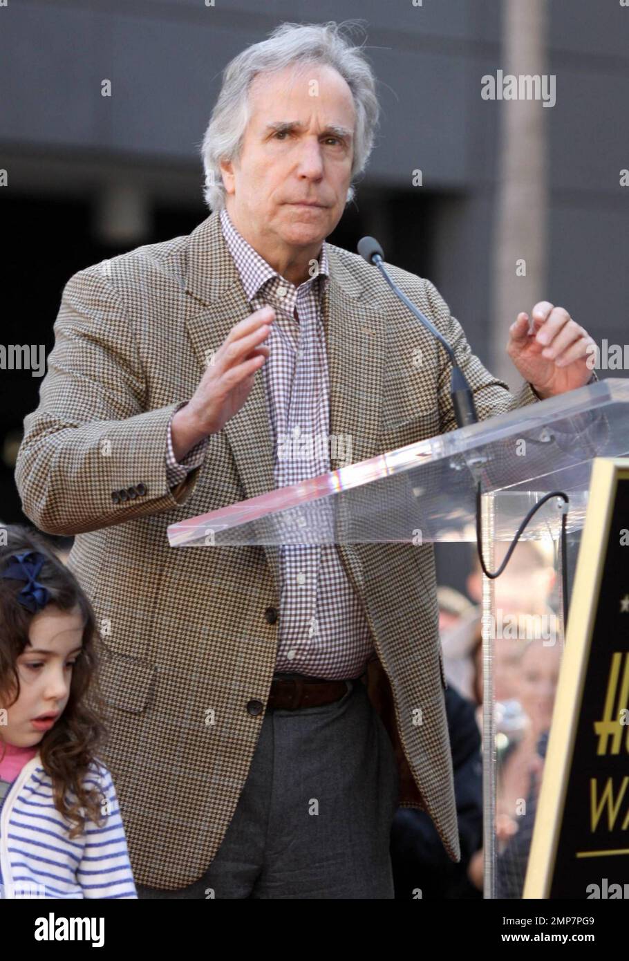 Joined by his wife Jackie, daughters Sadie and Sunny and his mother ...