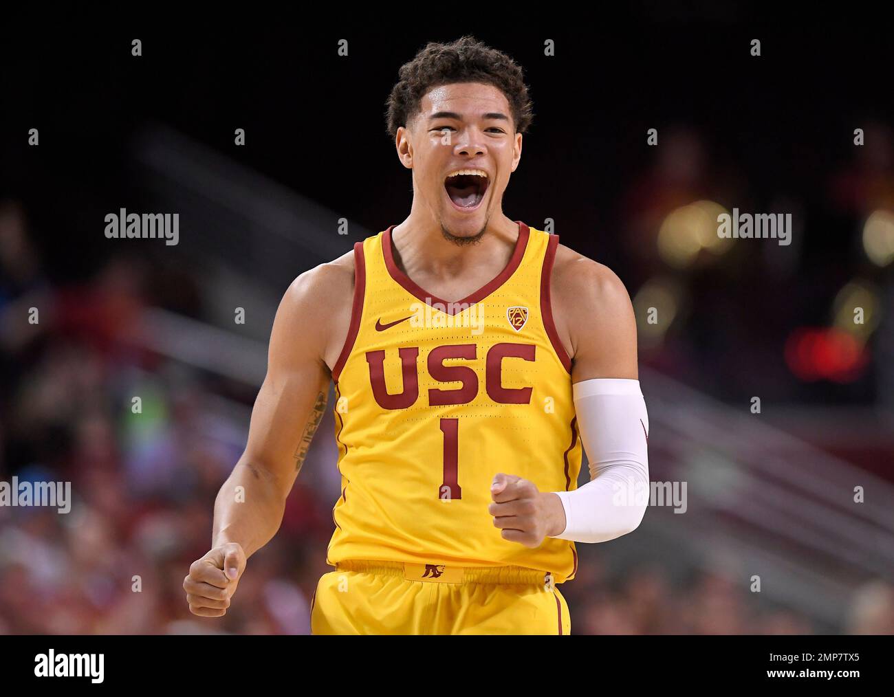 Southern California guard Jordan Usher celebrates after they scored ...