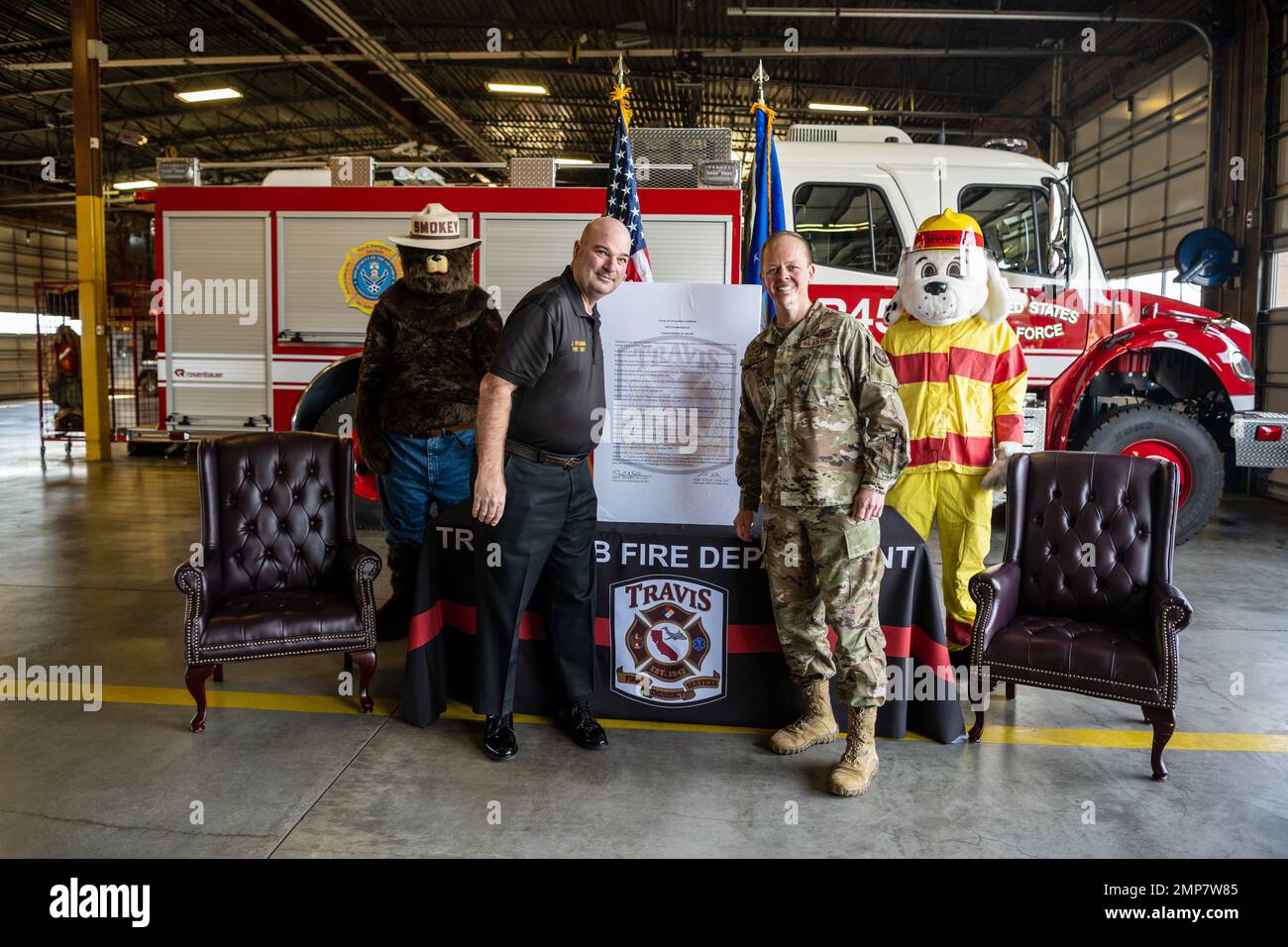 U.S. Air Force Col. Derek Salmi, right, 60th Air Mobility Wing ...