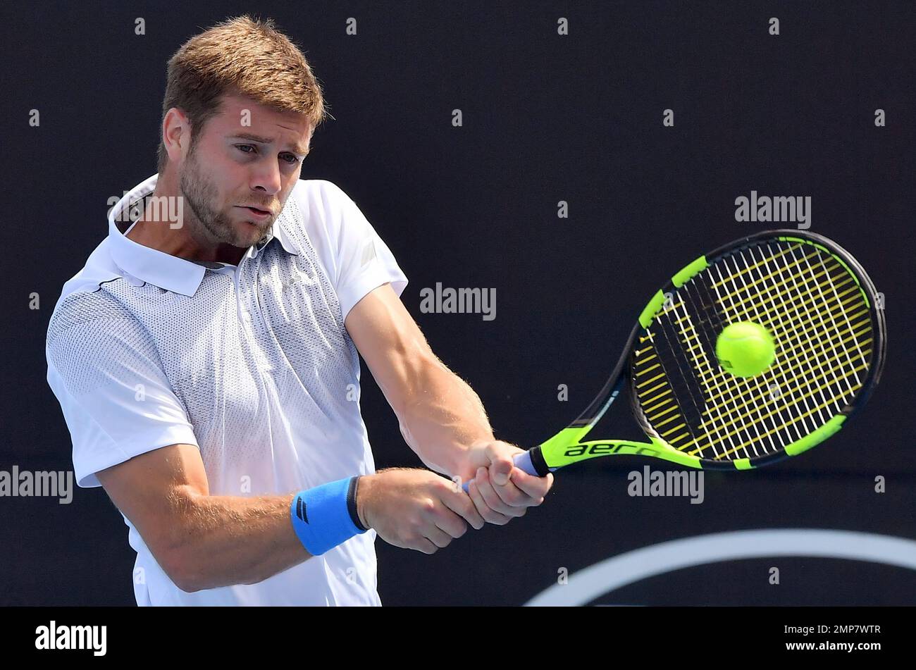 United States' Ryan Harrison makes a backhand return to Israel's Dudi ...