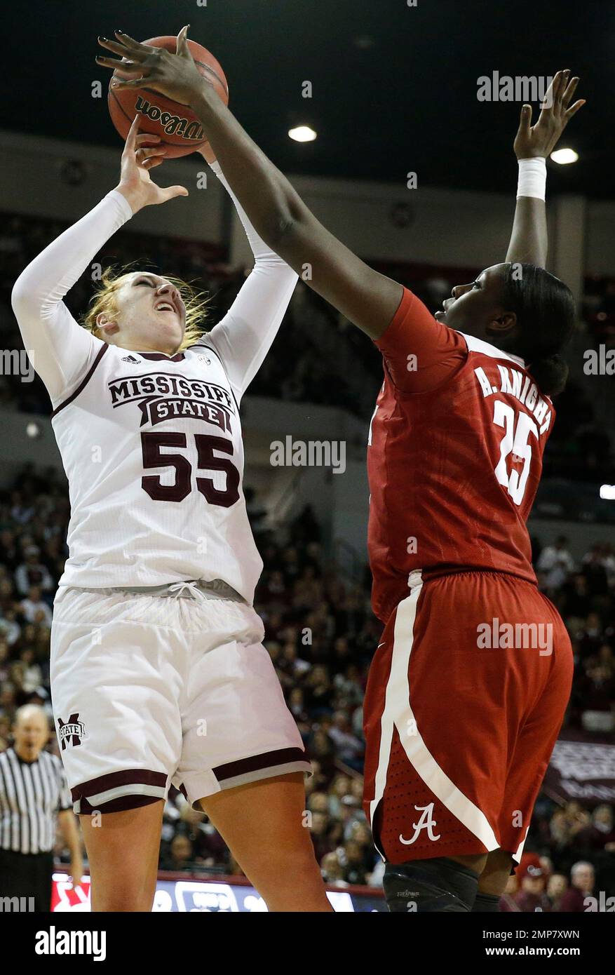 Mississippi State forward Chloe Bibby (55) has her shot blocked by ...