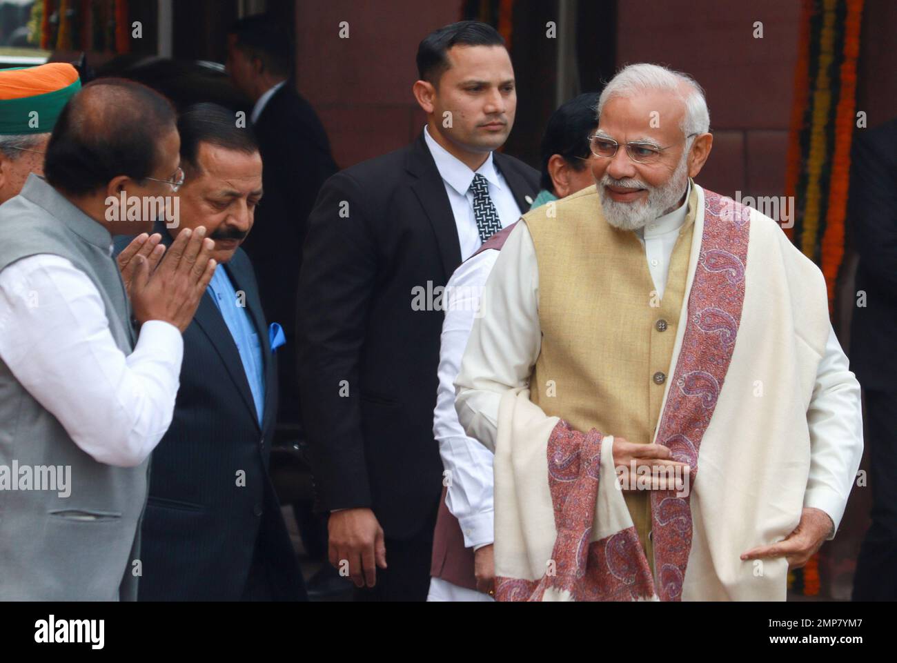 India's Prime Minister Narendra Modi (R) being received by his cabinet ...