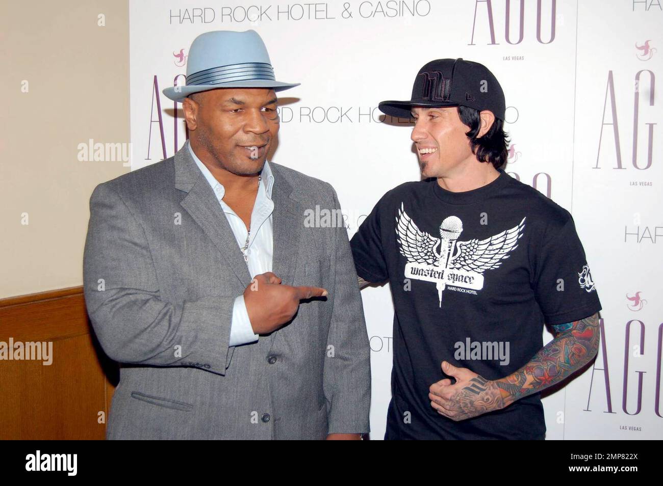Mike Tyson and Carey Hart attend the grand opening of Robert De Niro's ...