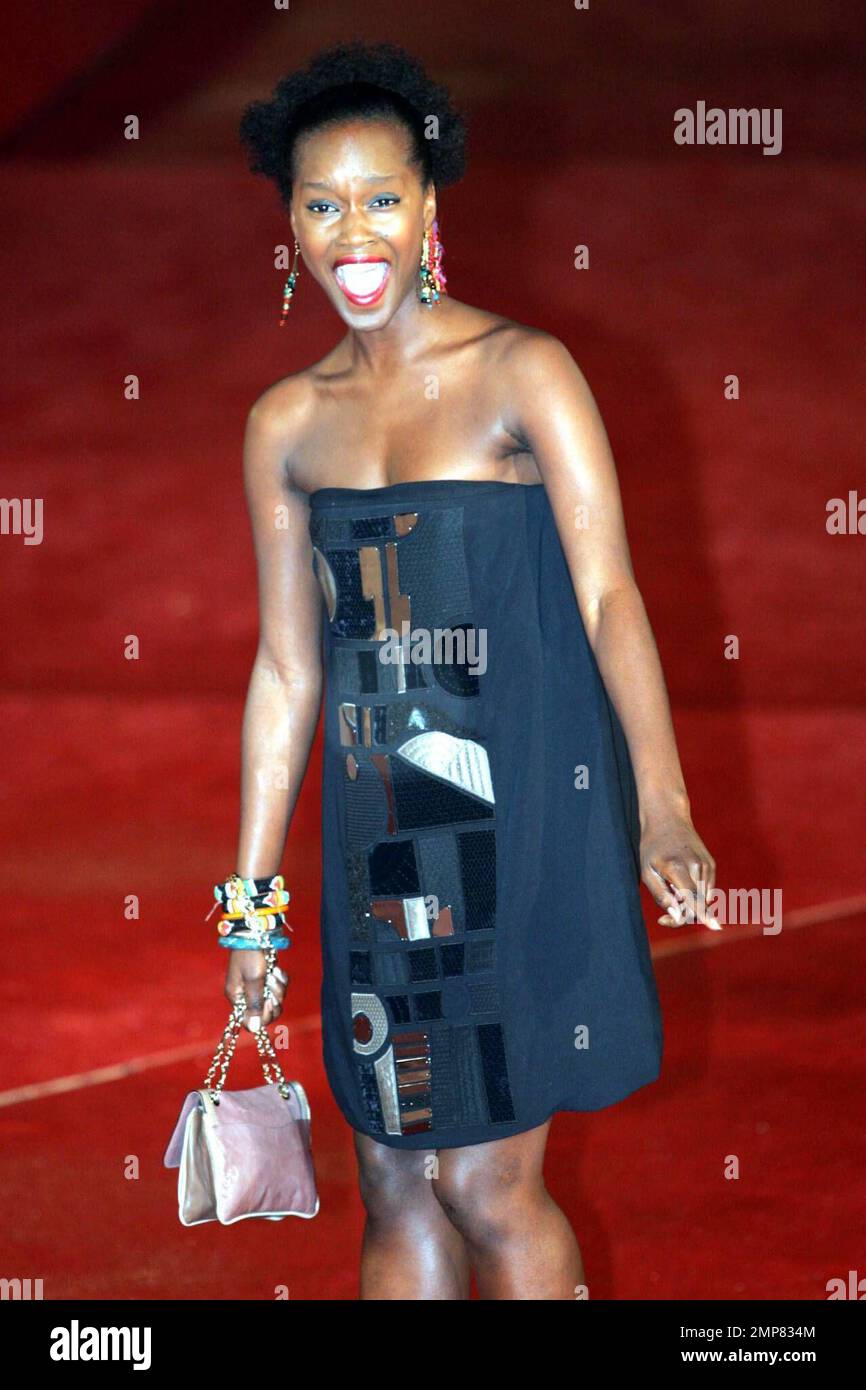 Fatou N'Diaye walks the red carpet at the premiere of "Aide-toi et le ...