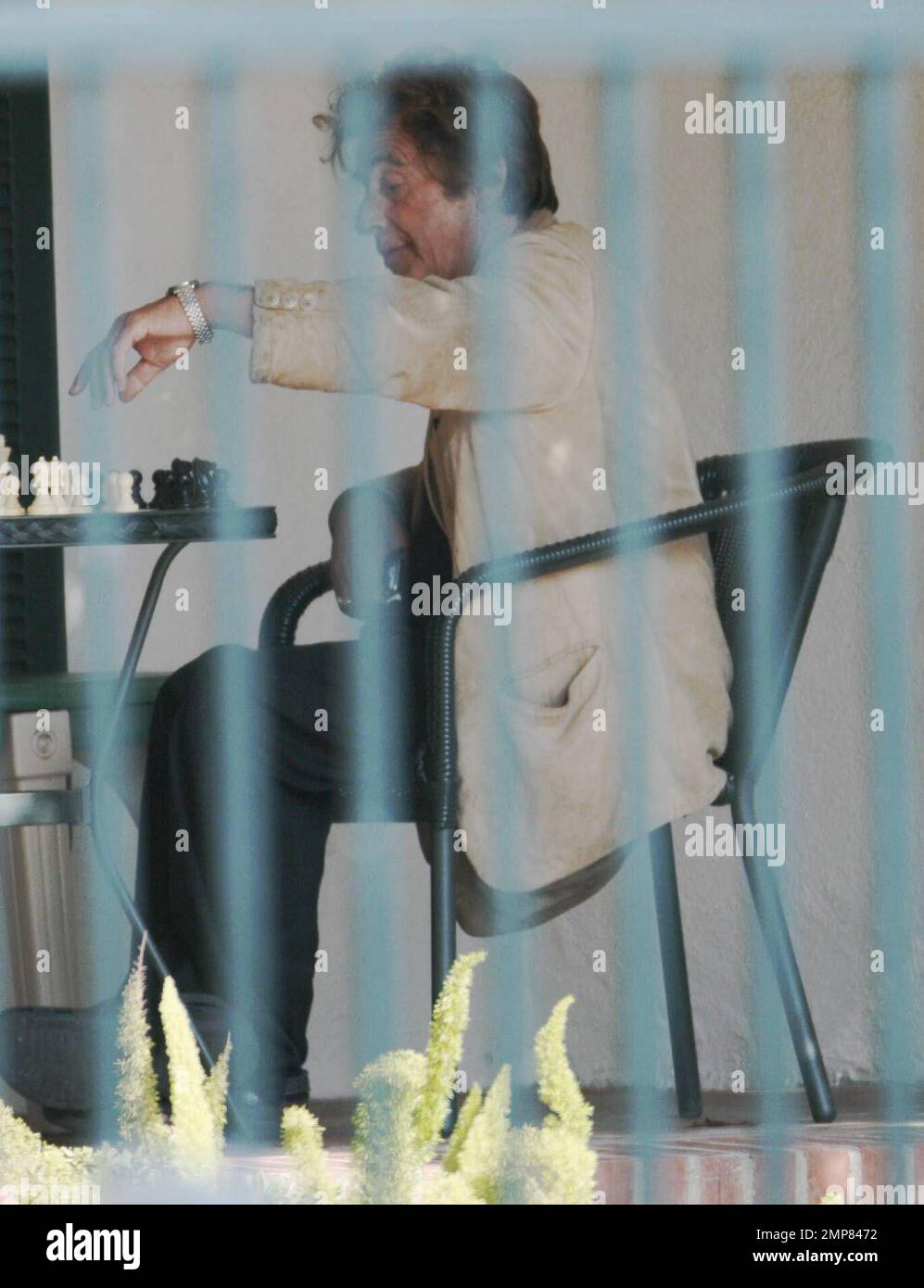 Exclusive!! Al Pacino plays a game of chess with a friend. The actor ...