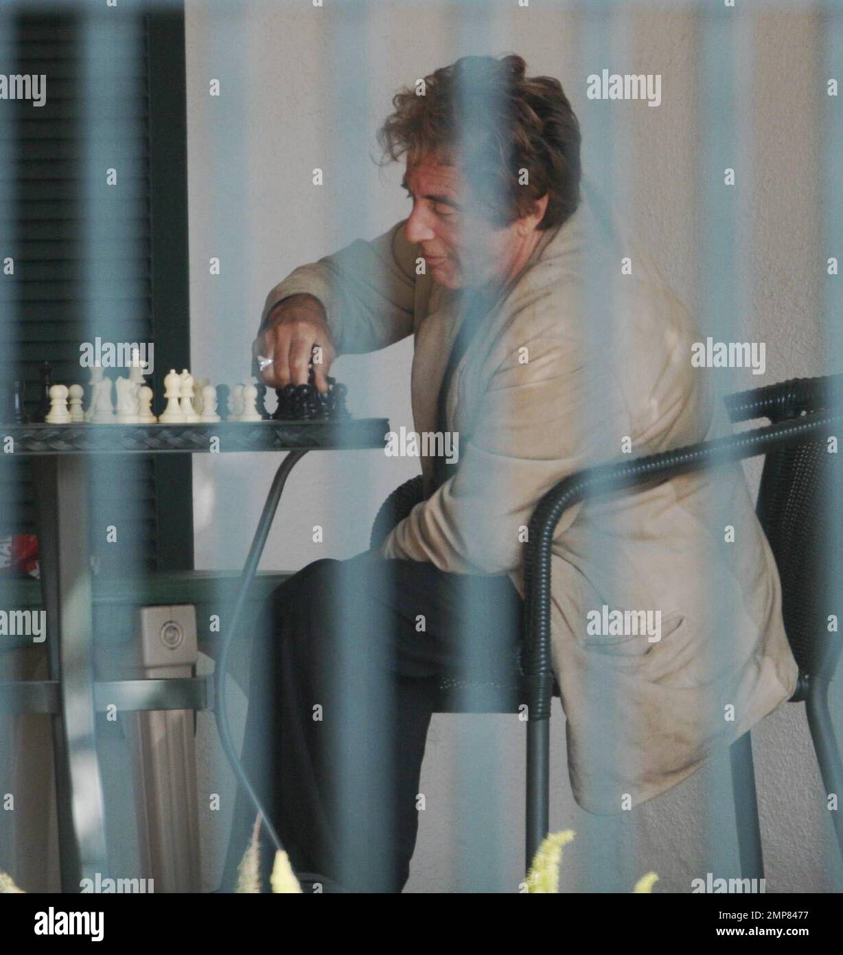 Exclusive!! Al Pacino plays a game of chess with a friend. The actor ...