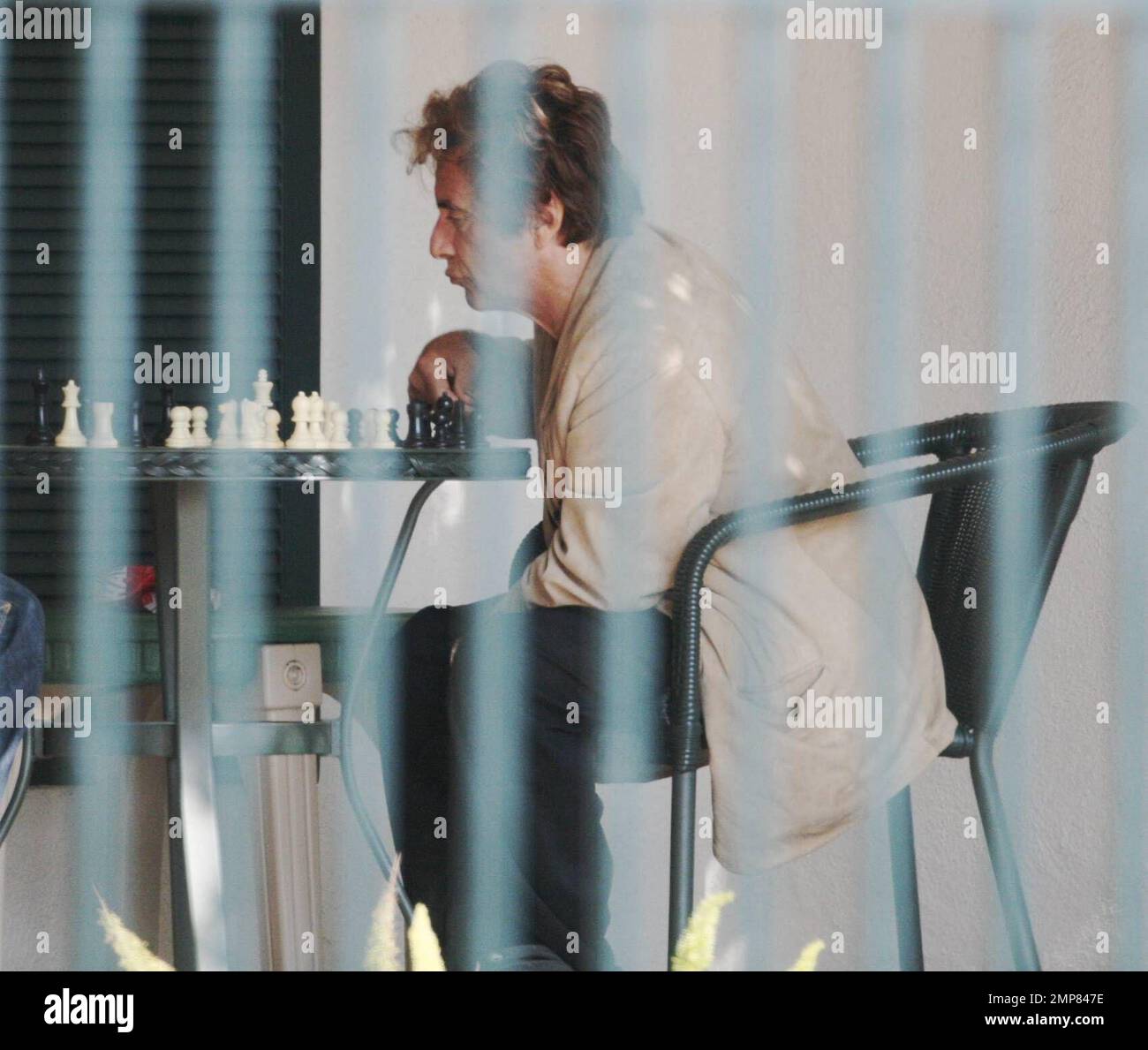 Exclusive!! Al Pacino plays a game of chess with a friend. The actor ...