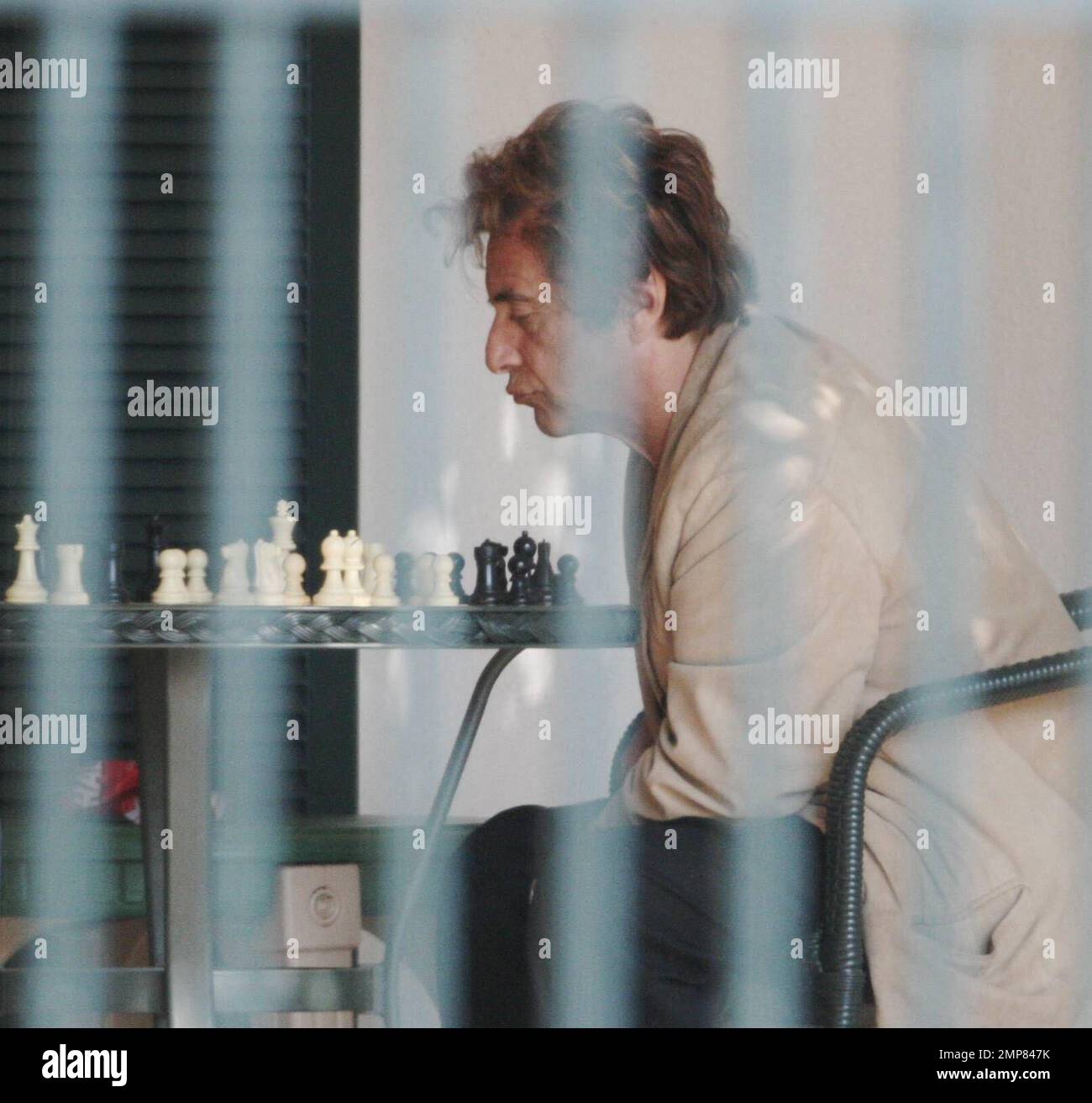 Exclusive!! Al Pacino plays a game of chess with a friend. The actor ...