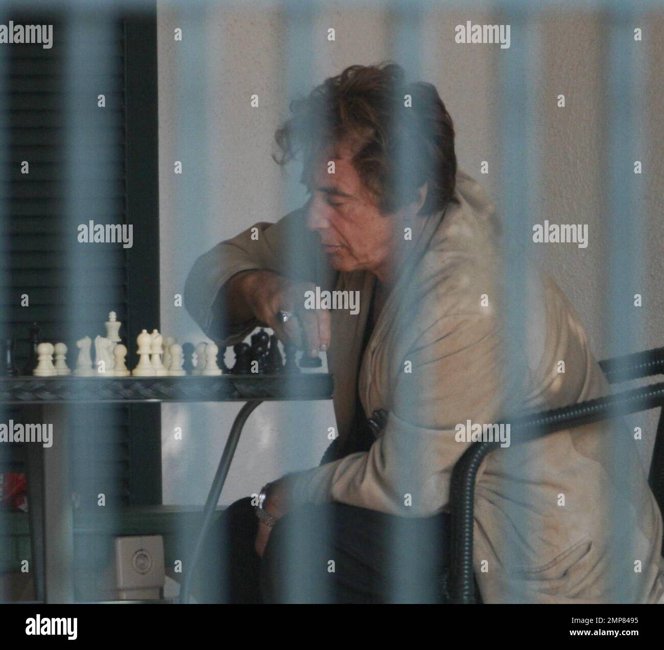 Exclusive!! Al Pacino plays a game of chess with a friend. The actor ...