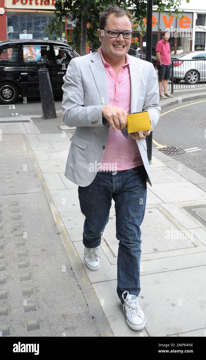 Radio host and comedian Alan Carr cheerfully arrives to BBC Radio 2 ...