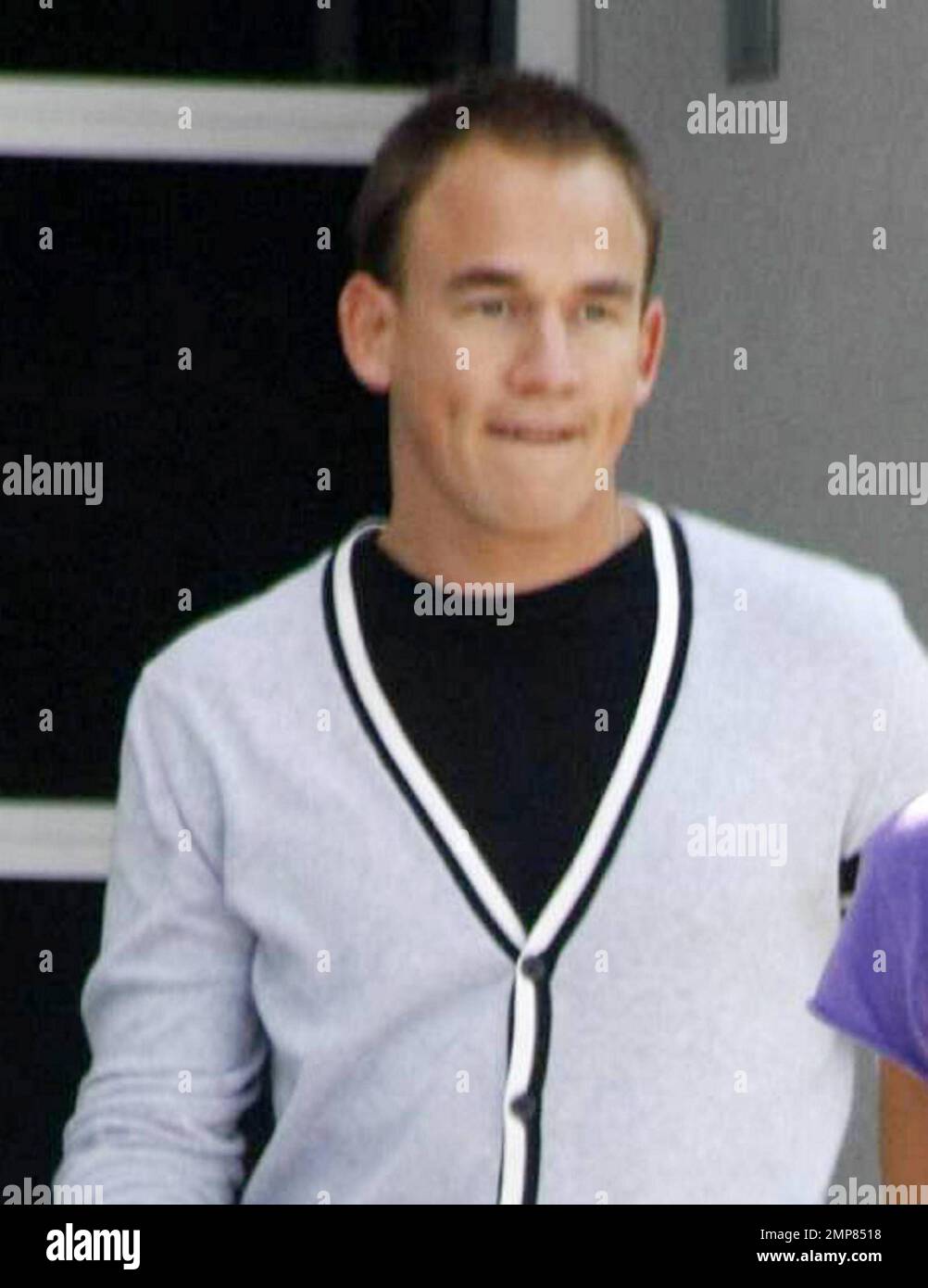 Singer Alanis Morissette holds hands with her husband of four months ...