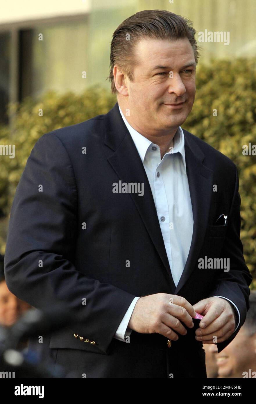 Alec Baldwin receives his star on the Hollywood Walk of Fame surrounded ...