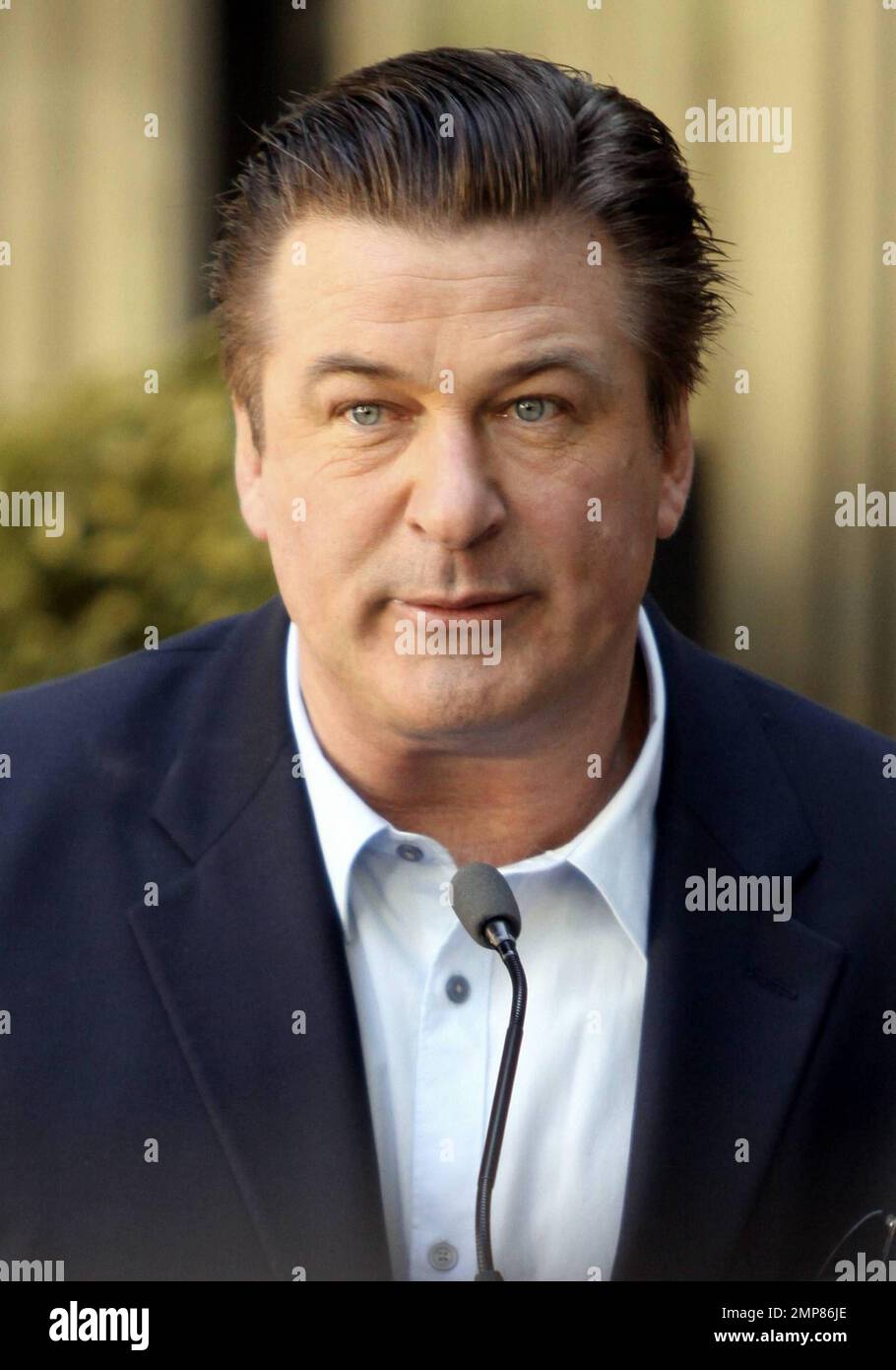 Alec Baldwin receives his star on the Hollywood Walk of Fame surrounded ...