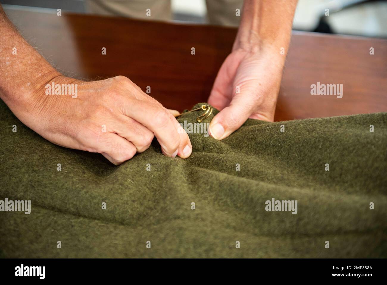 John Basden secures the remains of his great-uncle, U.S. Navy Fire ...