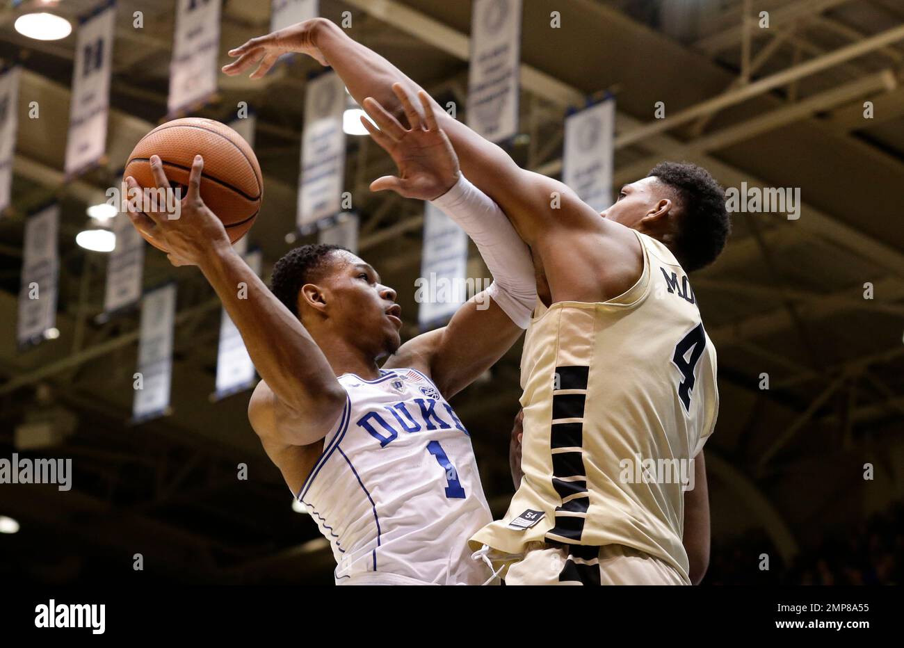 Duke's Trevon Duval (1) drives to the basket while Wake Forest's Doral ...