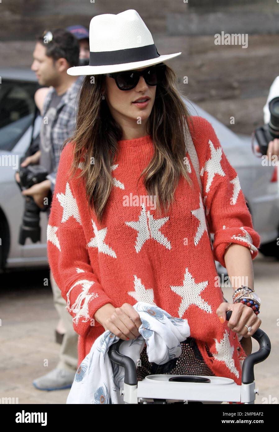 - Supermodel Alessandra Ambrosio wears a star-patterned sweater as she ...