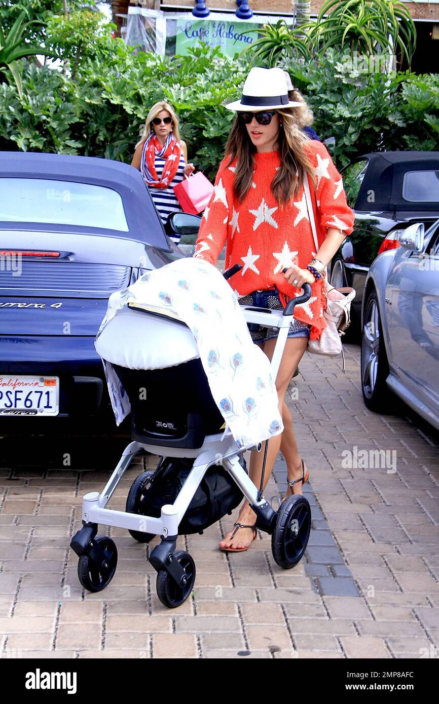 Supermodel Alessandra Ambrosio wears a star-patterned sweater as she ...