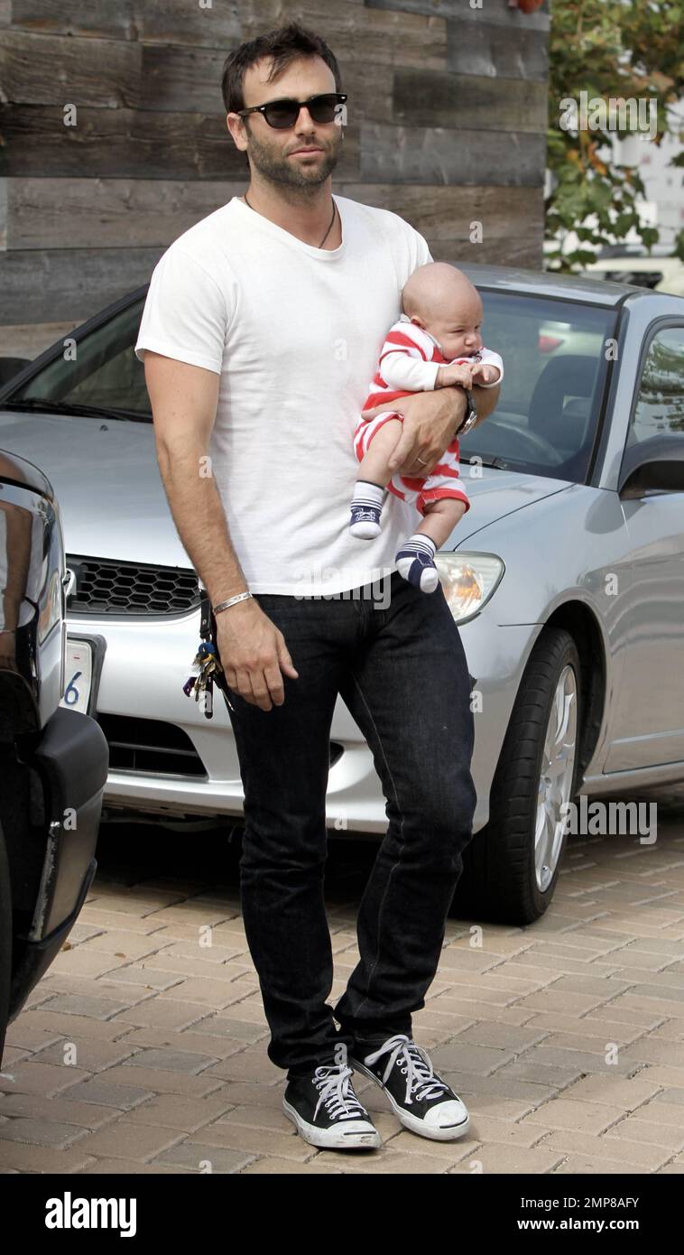 Supermodel Alessandra Ambrosio wears a star-patterned sweater as she ...