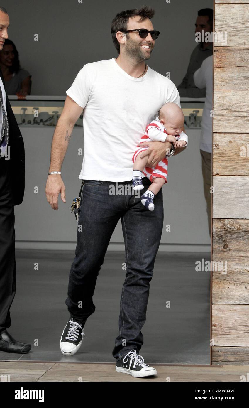 Supermodel Alessandra Ambrosio wears a star-patterned sweater as she ...