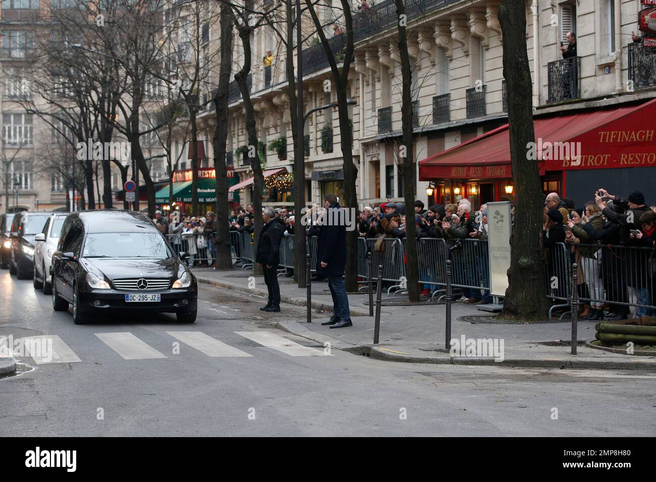 The convoy arrives at the Montmartre cemetery for French singer France ...