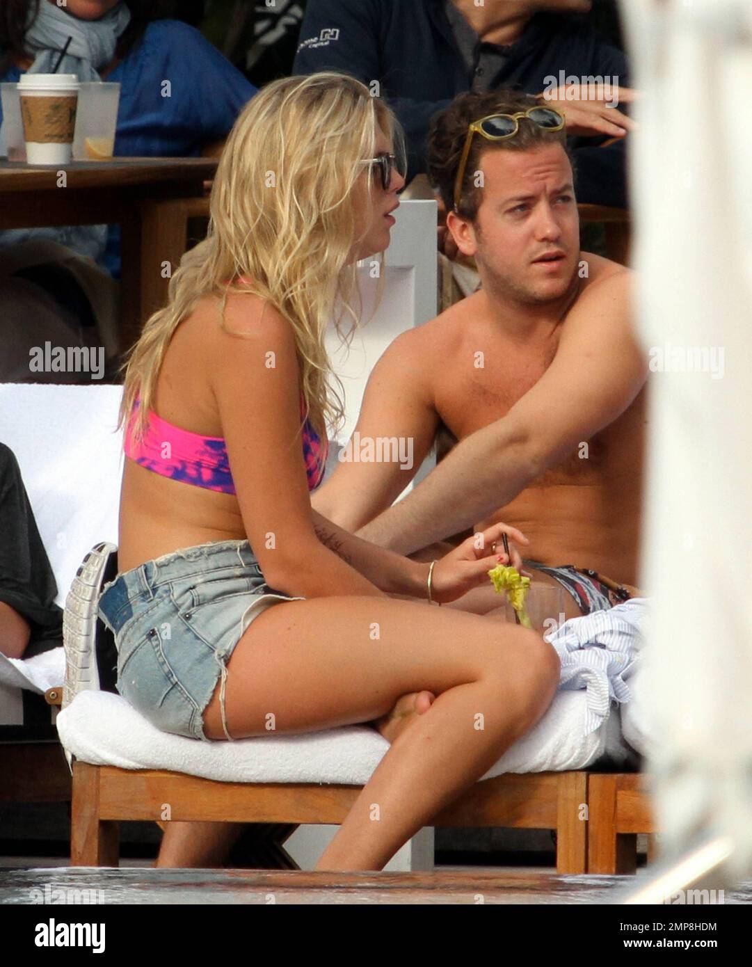 Alexandra Richards, daughter of rocker Keith Richards, spends an afternoon poolside with pals ...