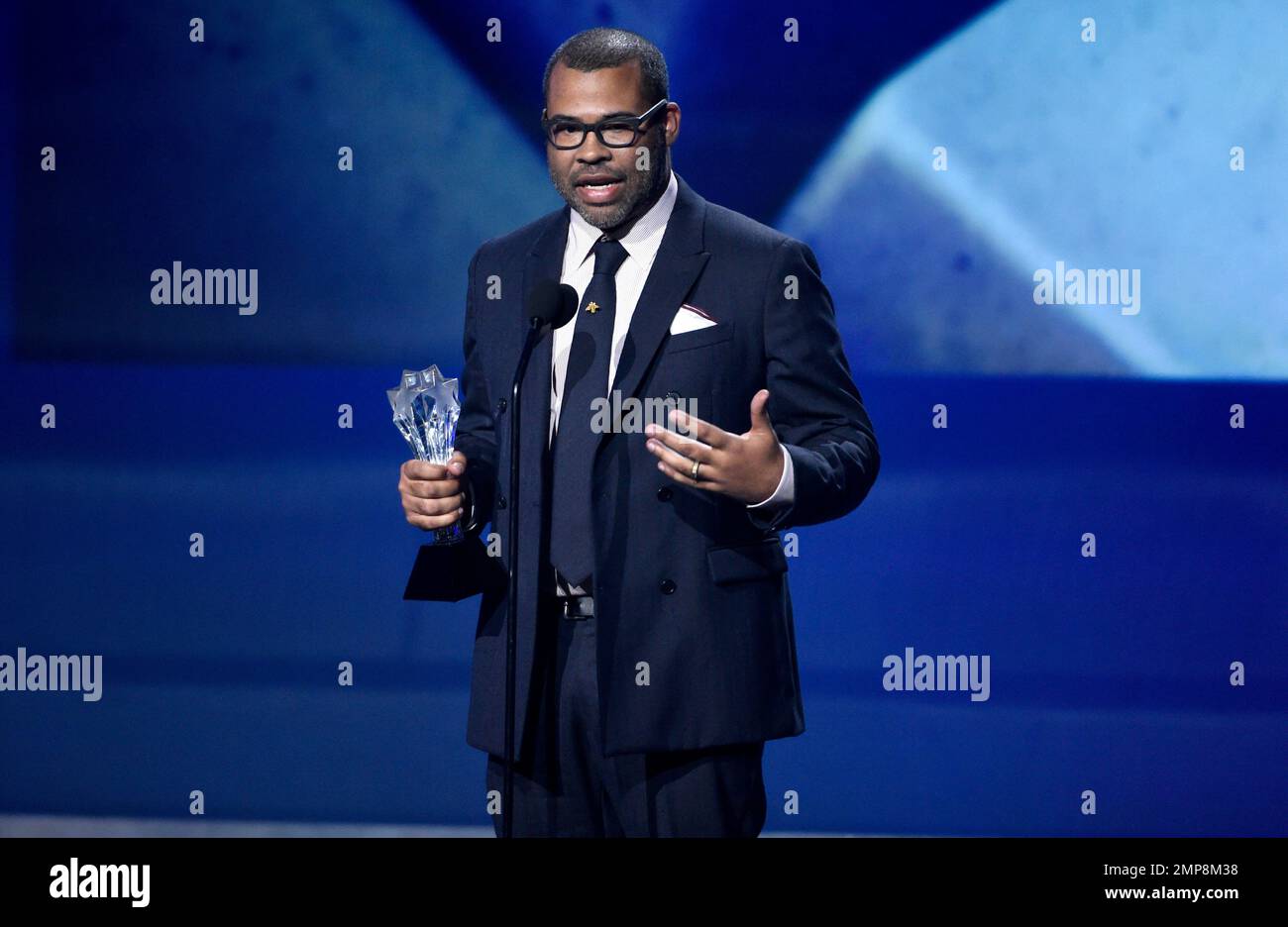 Jordan Peele accepts the award for best original screenplay for "Get ...