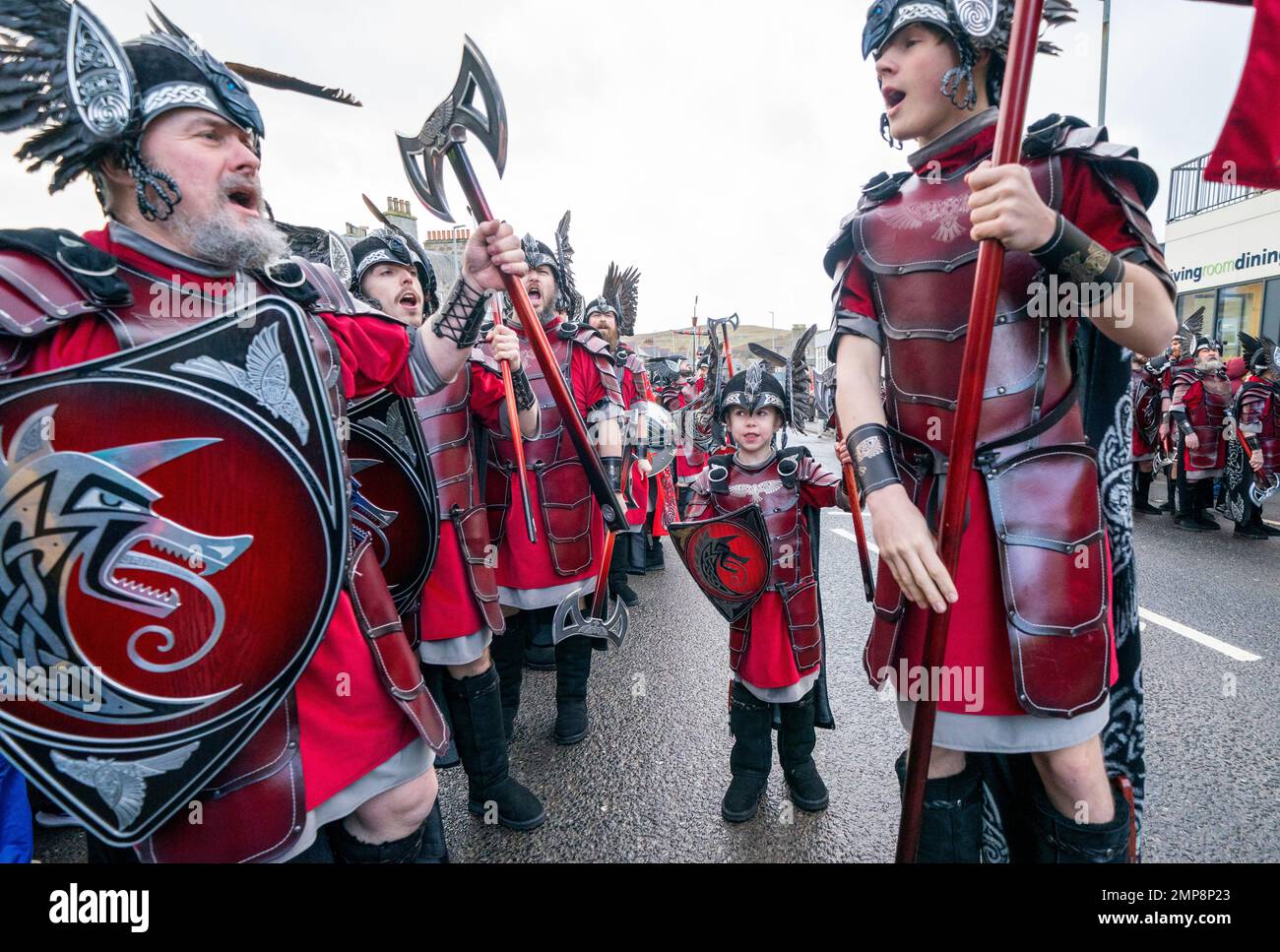 Members of the Jarl Squad march through Lerwick on the Shetland Isles ...