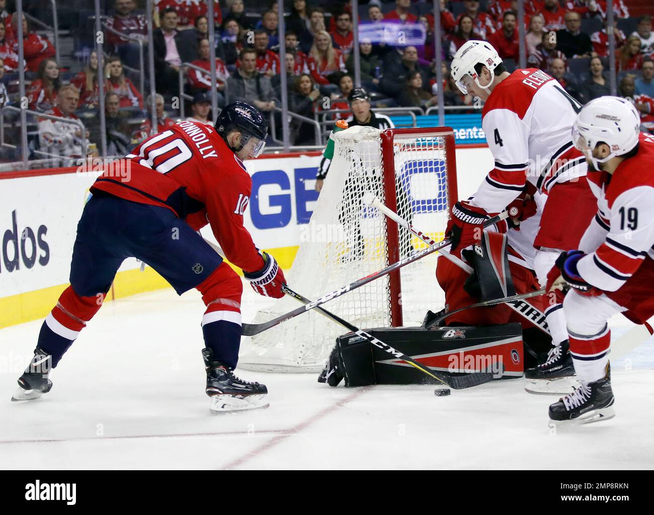 Washington Capitals right wing Brett Connolly (10) tries to shoot as ...