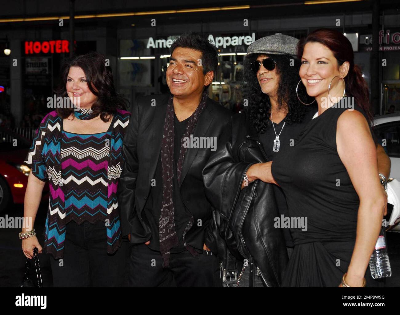 Ann Serrano Lopez, George Lopez, Slash and Perla Hudson at the premiere ...