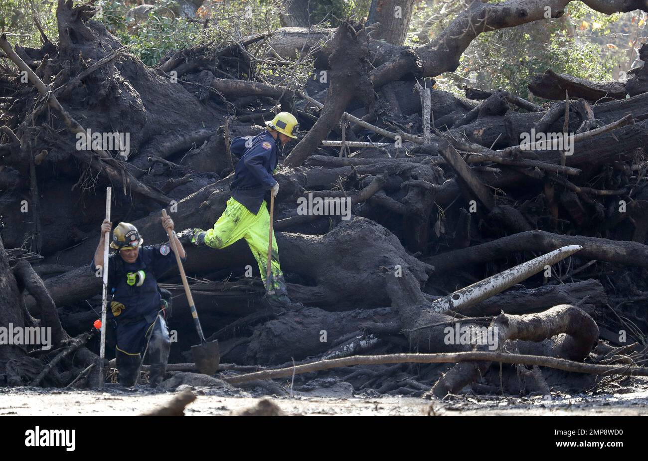 Emergency crew members work on storm damage in Montecito, Calif ...