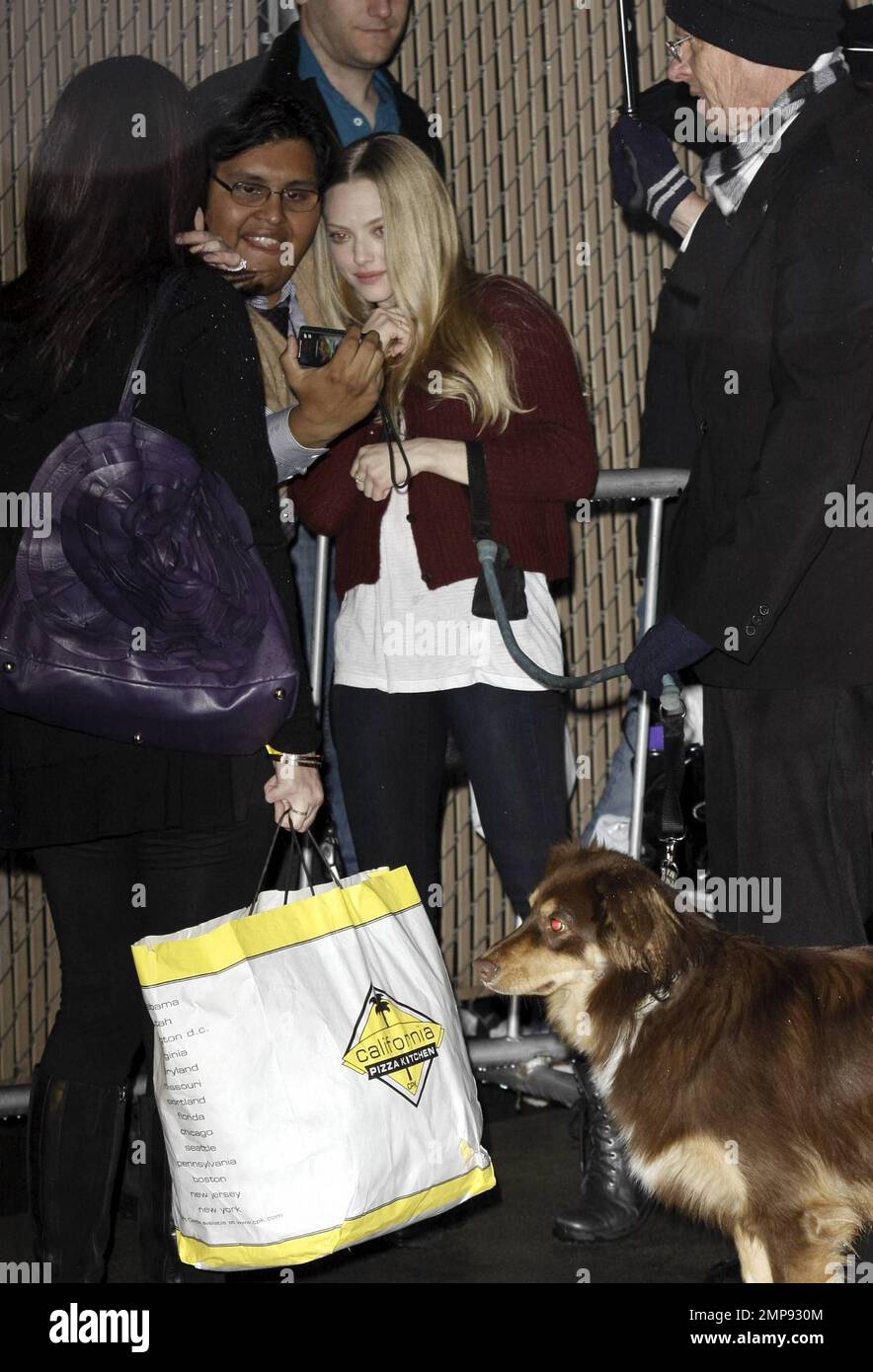 Amanda Seyfried brings along a four-legged friend as she arrives at the ...
