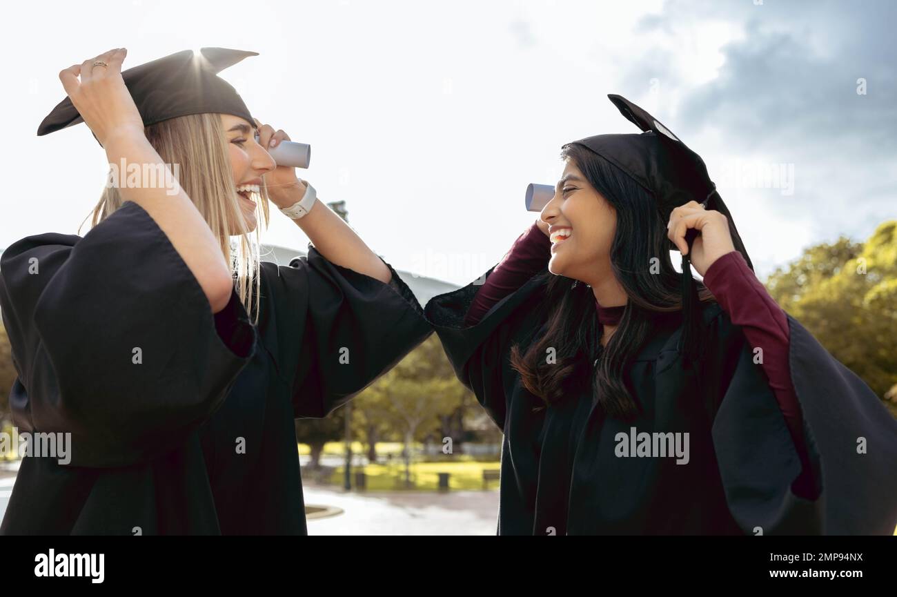 Graduate women, friends and smile together with graduation cap ...