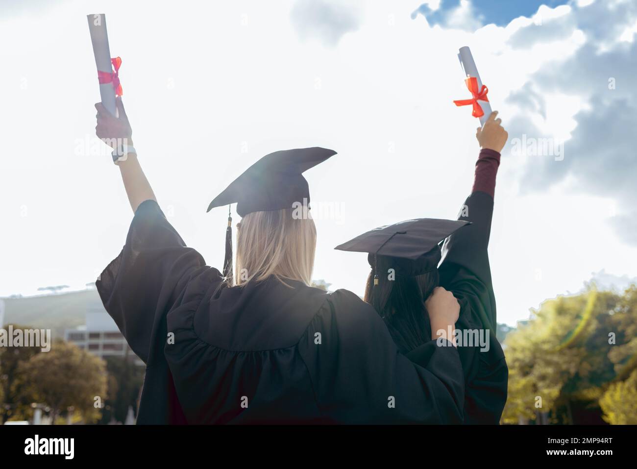 Graduation, woman friends and certificate with back for celebration ...