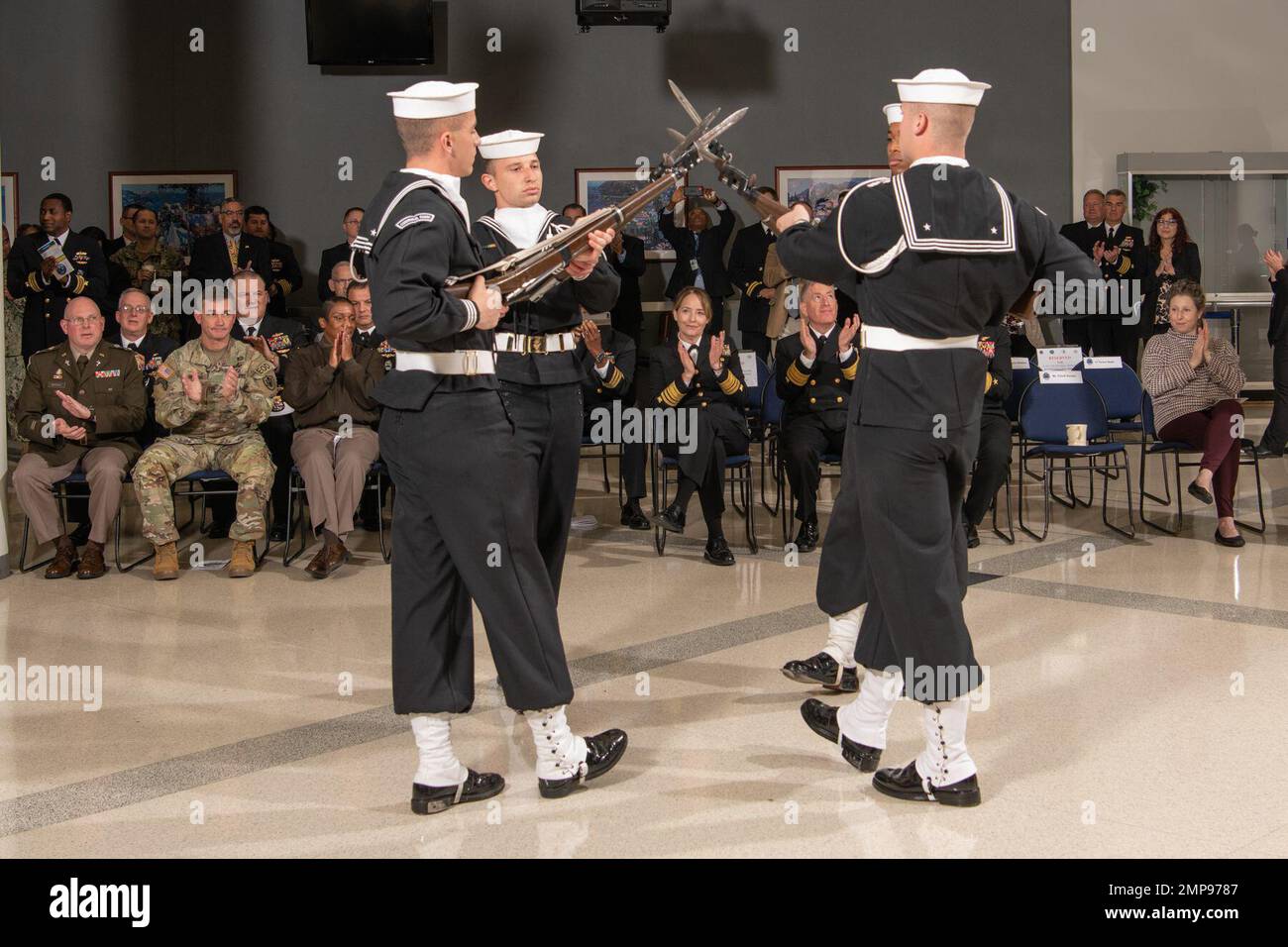 The U.S. Navy Drill Team gives a special performance at the Defense ...